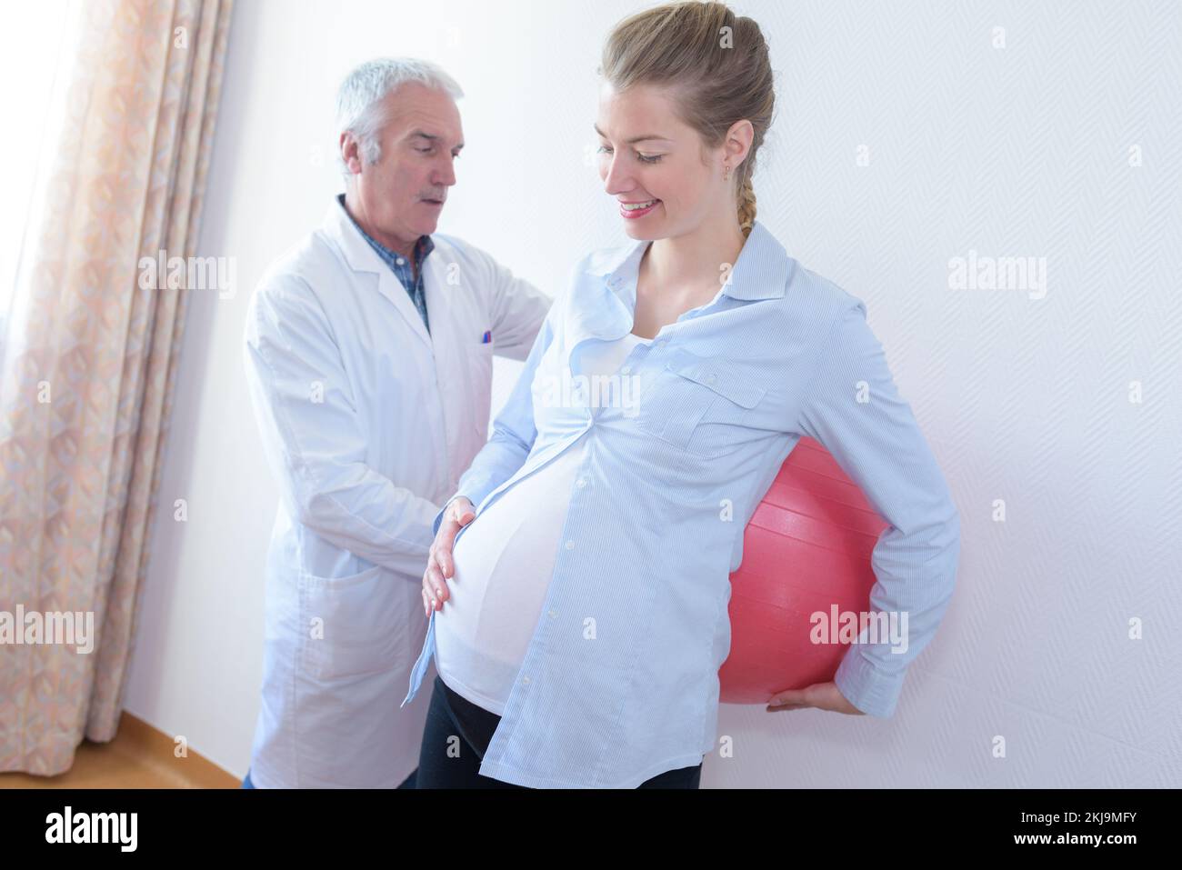 pregnant woman doing labor exercises Stock Photo - Alamy