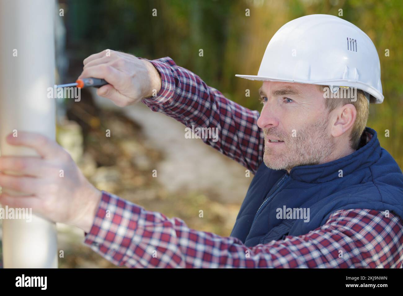 Repairing something hi-res stock photography and images - Alamy