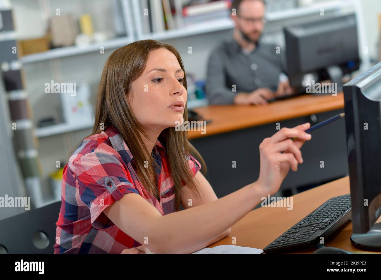 a busy office worker in the office Stock Photo - Alamy
