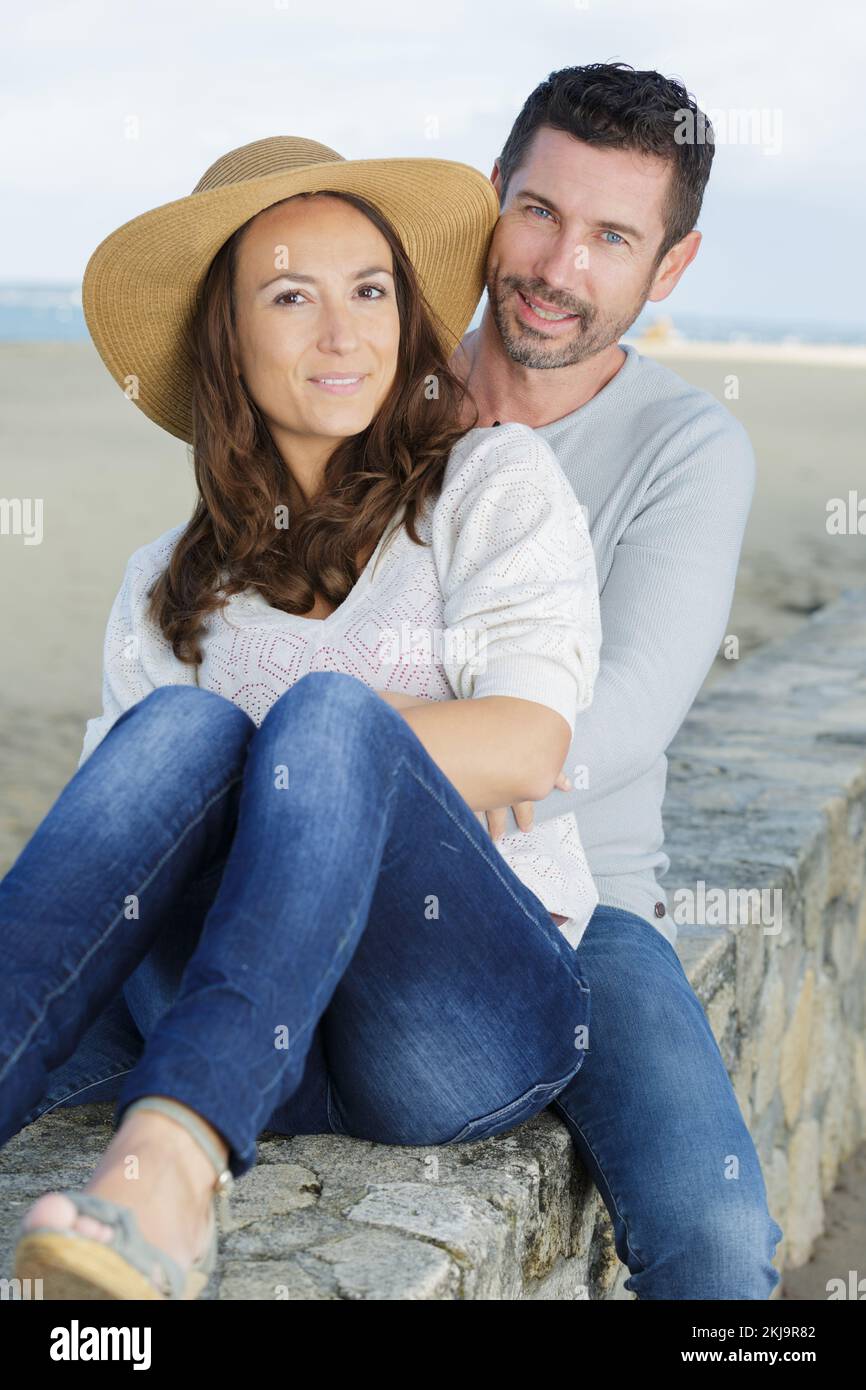 a happy couple hugging together Stock Photo - Alamy