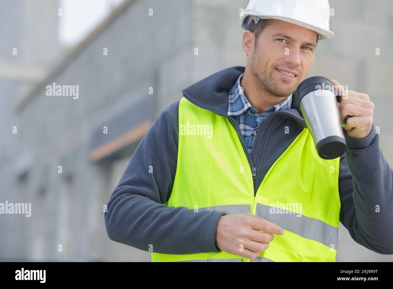 Construction drinking coffee construction site hi-res stock photography ...