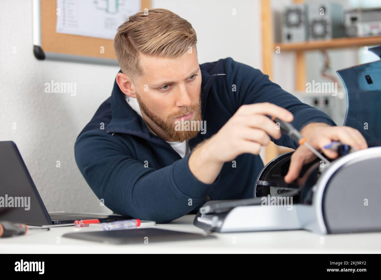 Worker checking scanning in hi-res stock photography and images - Alamy