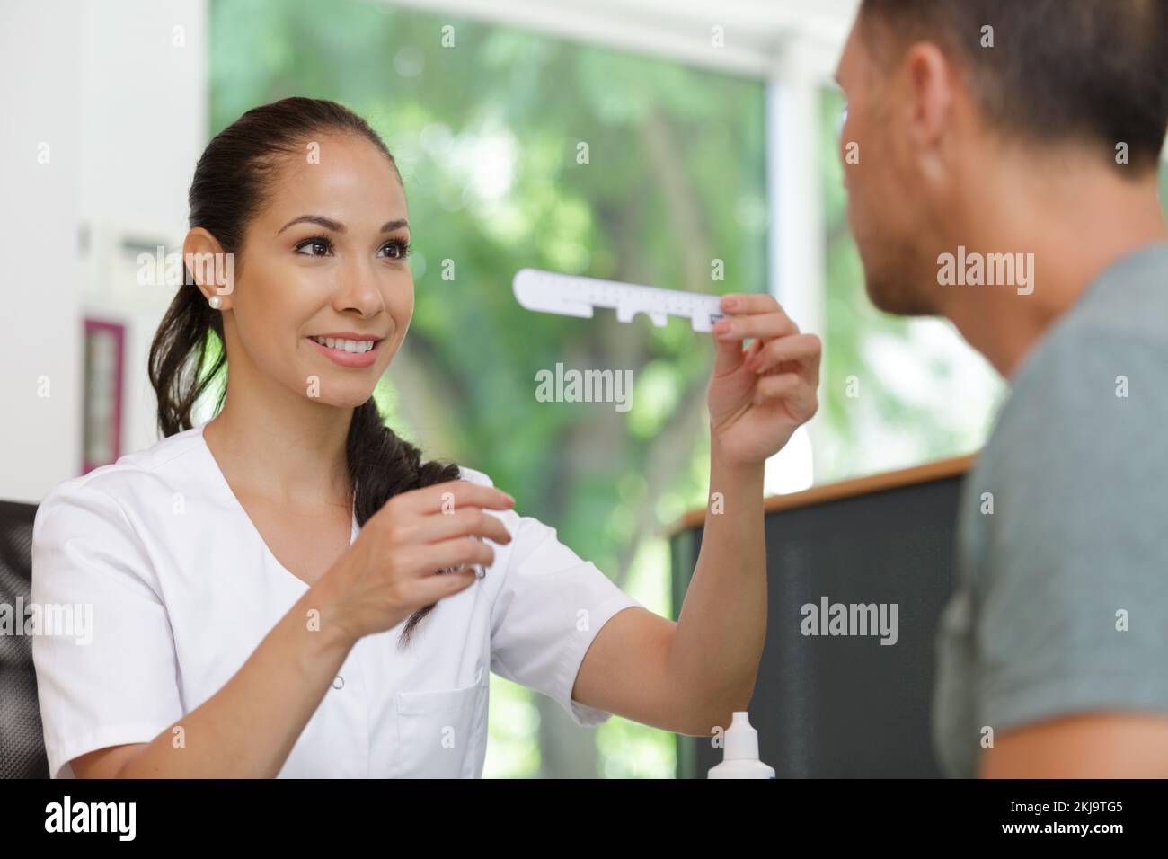 woman and man during eye control test Stock Photo - Alamy