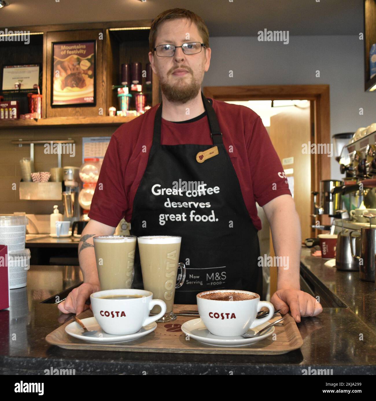 Indoor Portrait Of A Costa Coffee Worker Making Drinks For Customers ...