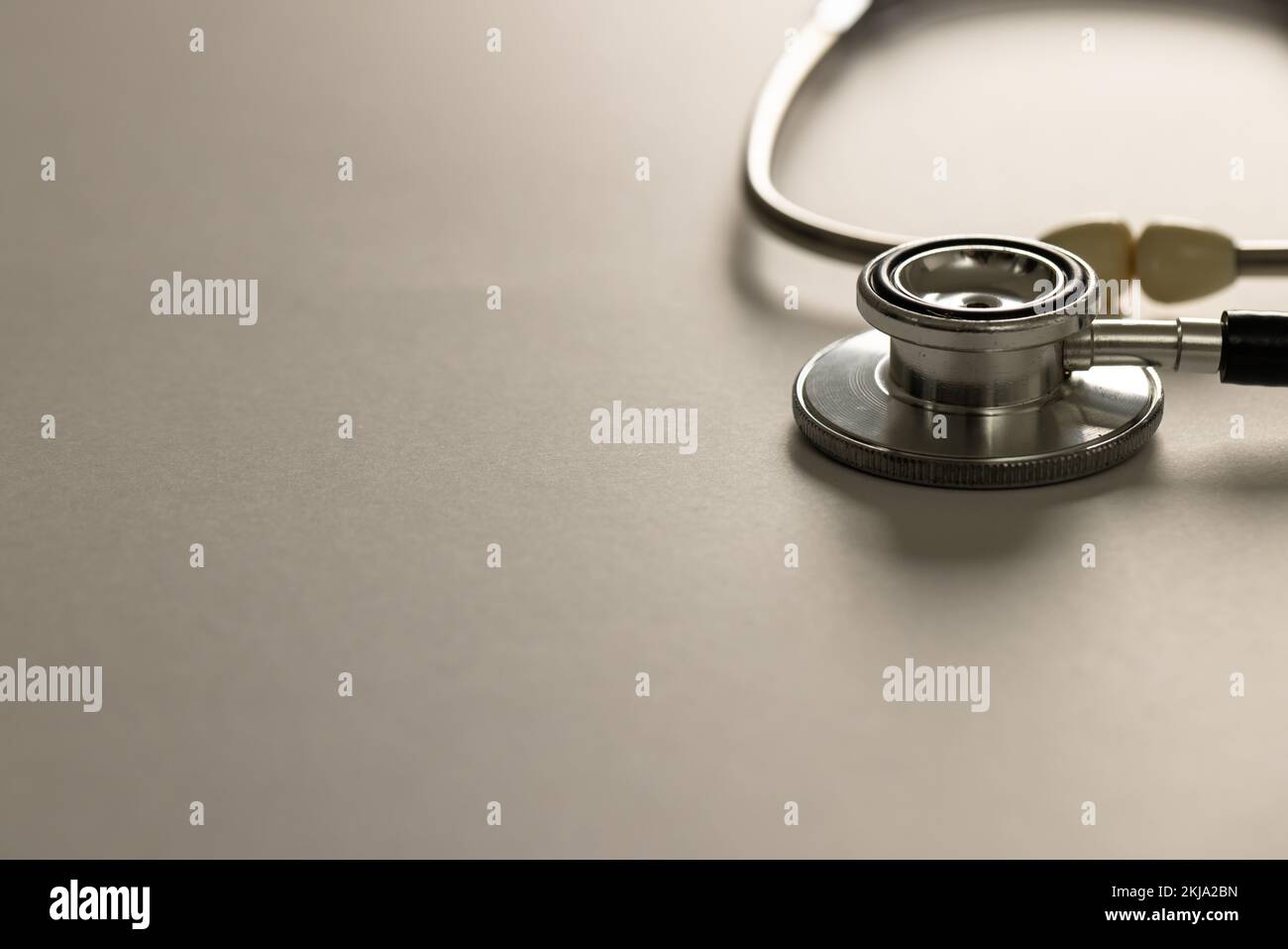 Composition of stethoscope on white background with shadow, copy space ...