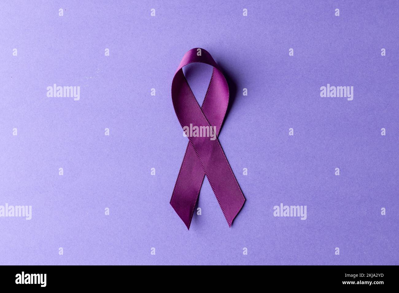 Composition of purple add or adhd awareness ribbon on purple background ...
