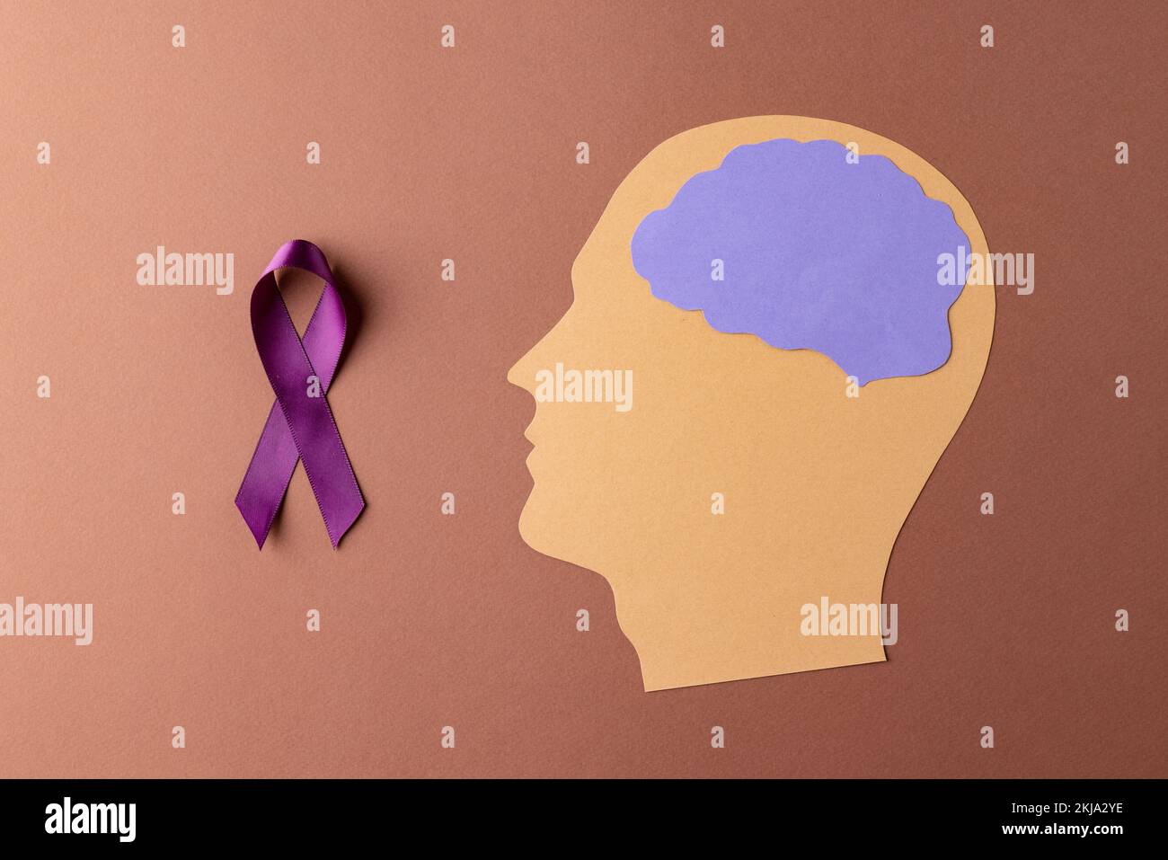 Purple add or adhd awareness ribbon and head with purple brain on brown ...