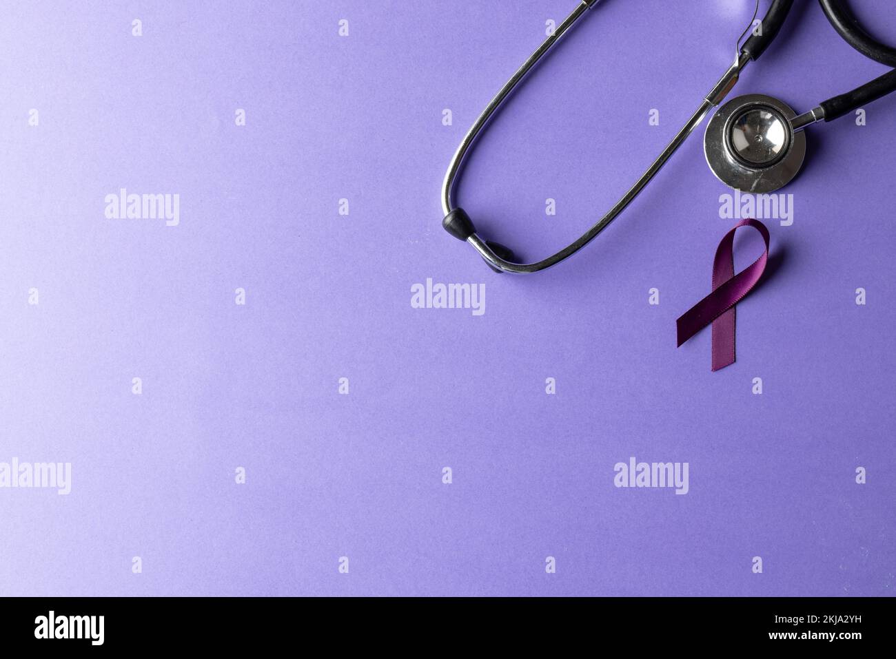 Stethoscope and purple add or adhd awareness ribbon on purple ...