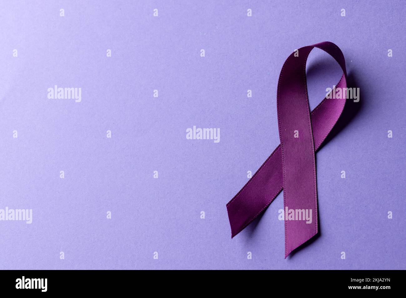 Composition of purple add or adhd awareness ribbon on purple background ...