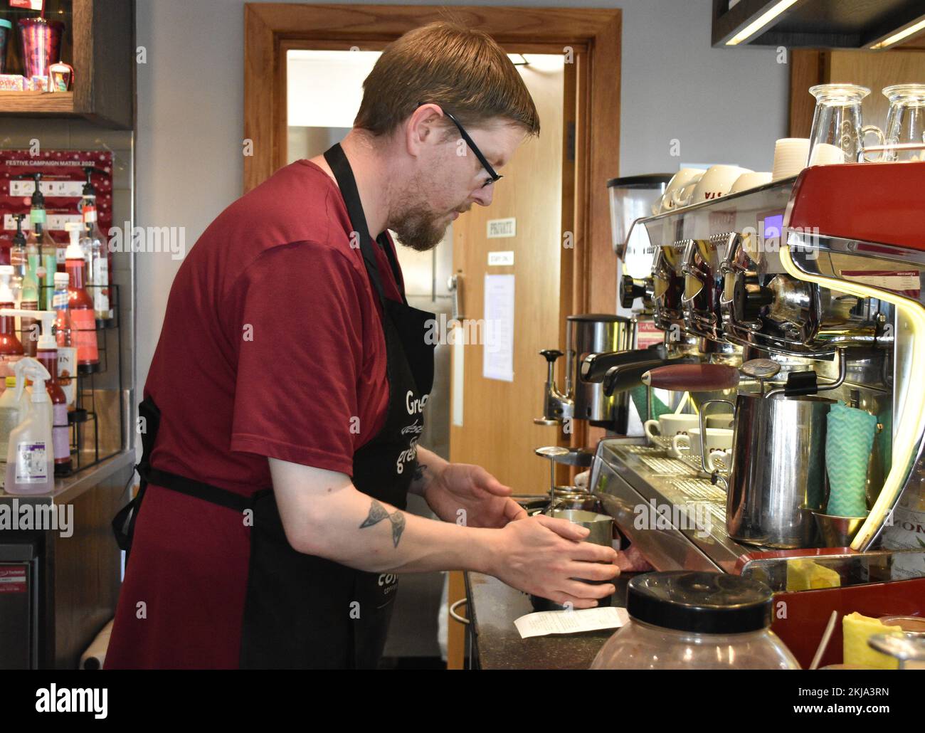 Indoor Portrait Of A Costa Coffee Worker Making Drinks For Customers ...