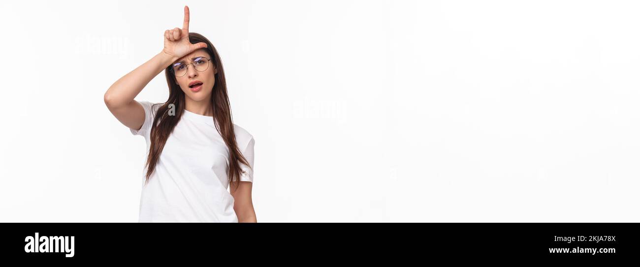 Portrait of arrogant and sassy, confident young stylish woman in ...