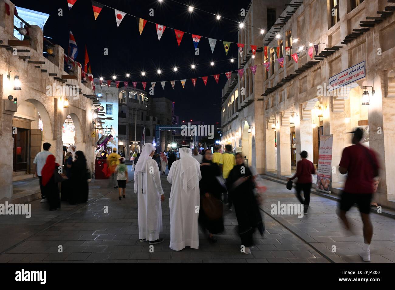 Doha, Qatar. 24th Nov, 2022. Tourists and locals walk through the "Souq ...