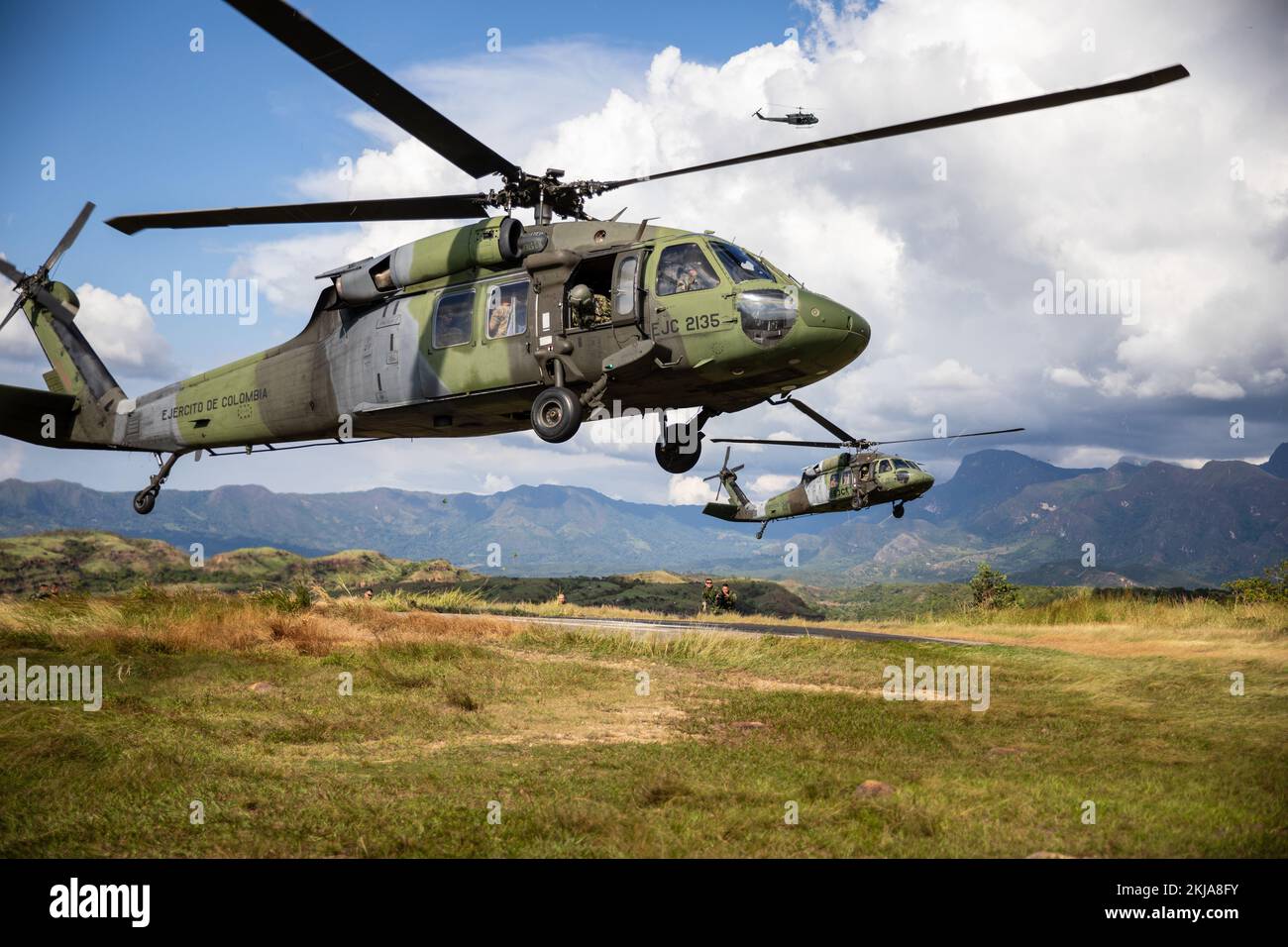 A pair of Colombian Army UH-60 Black Hawks prepare to land during lane ...