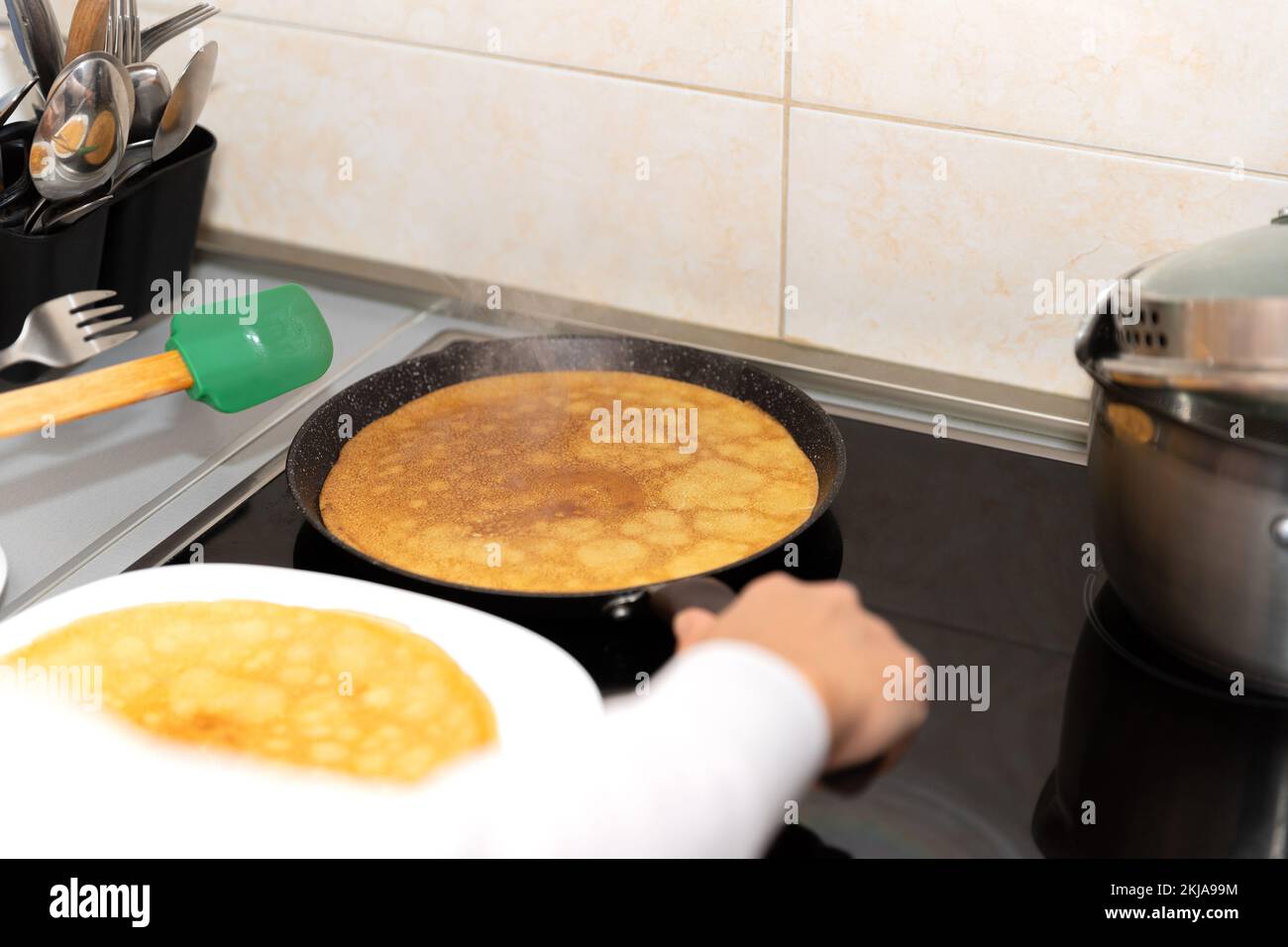 The process of cooking pancakes at home Stock Photo - Alamy