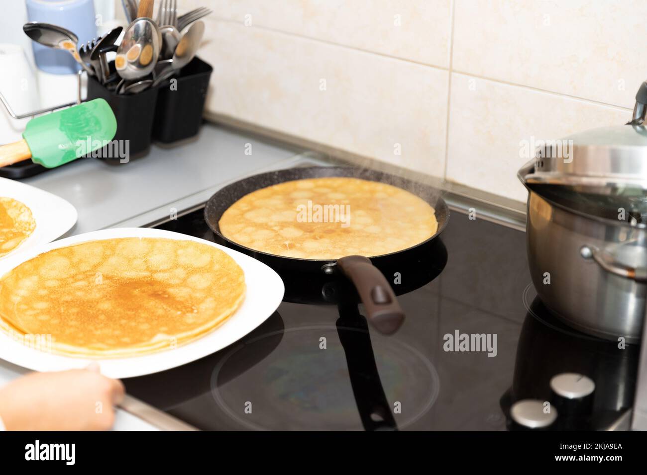 The process of cooking pancakes at home Stock Photo - Alamy
