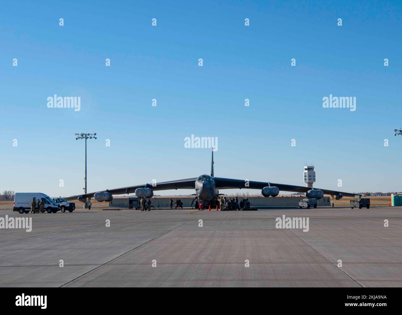Team Minot Airmen load weapons into a B-52H Stratofortress, during ...