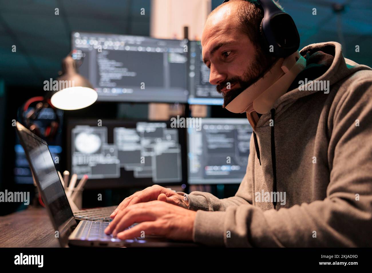 Software Developer With Medical Neck Foam Working On Coding Using Source Code To Develop New