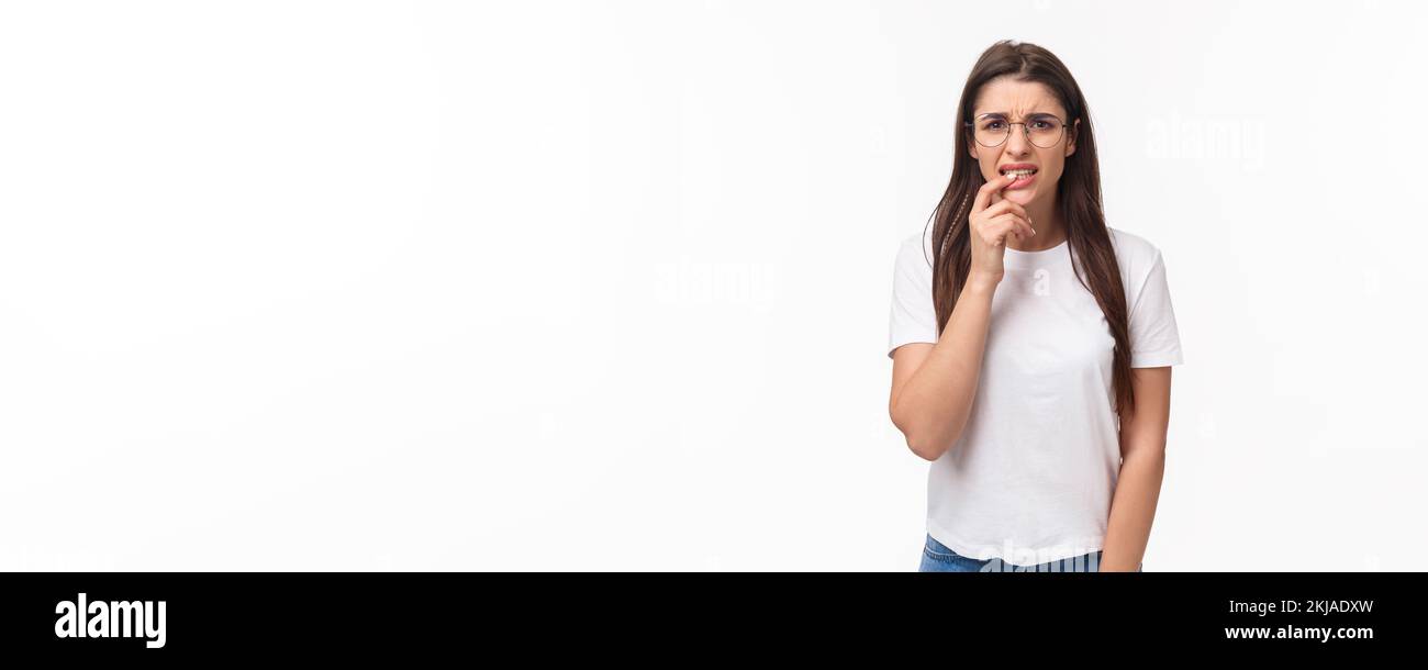 Waist-up portrait of embarrassed young cute girl feel nervous ...