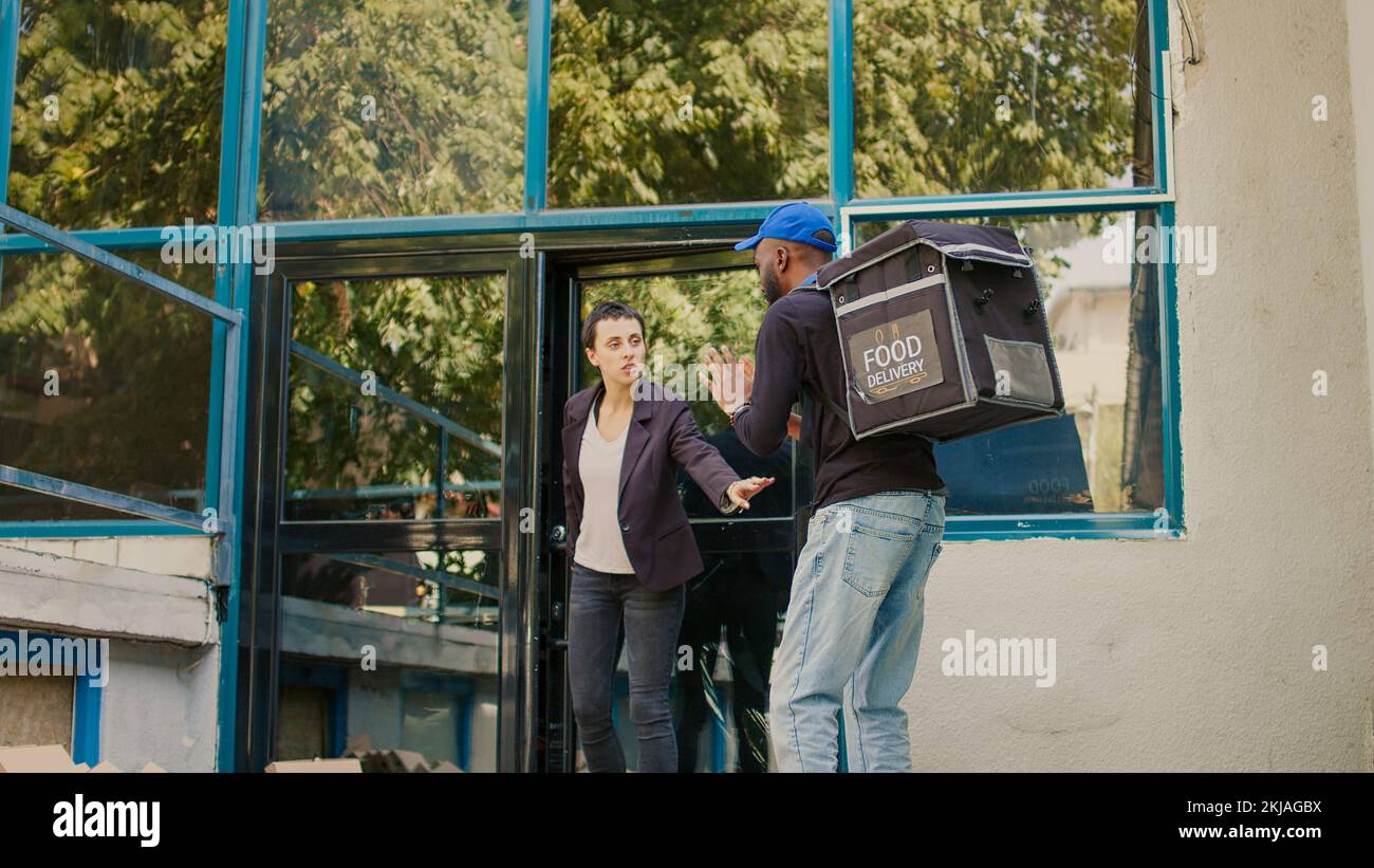 Delivery man falling stack boxes hi-res stock photography and images ...