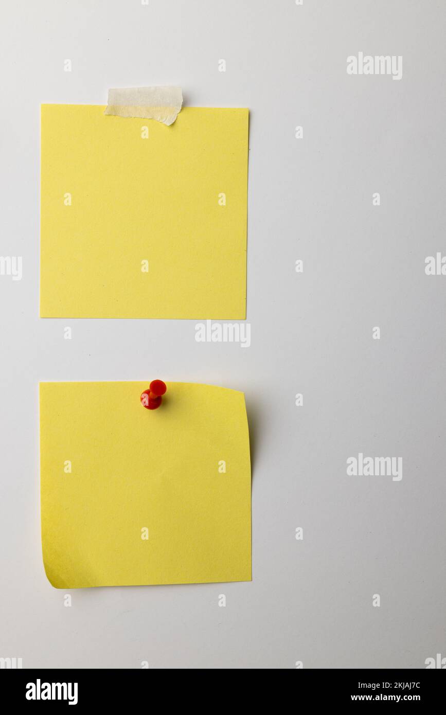 Yellow sticky memo notes and copy space on white background Stock Photo ...