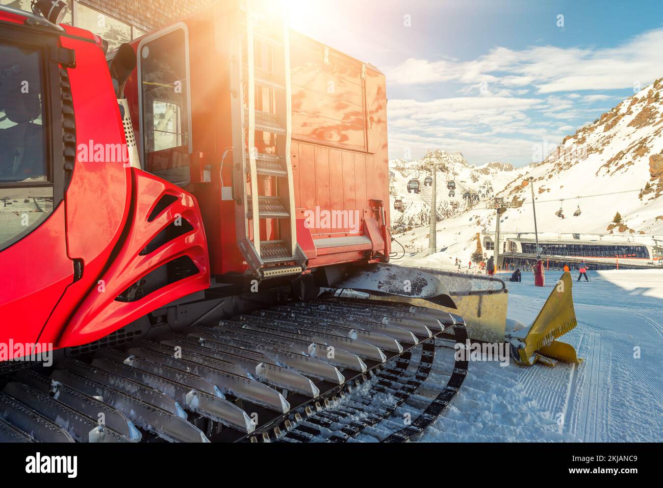 Red modern snowcat ratrack with snowplow snow grooming machine ...