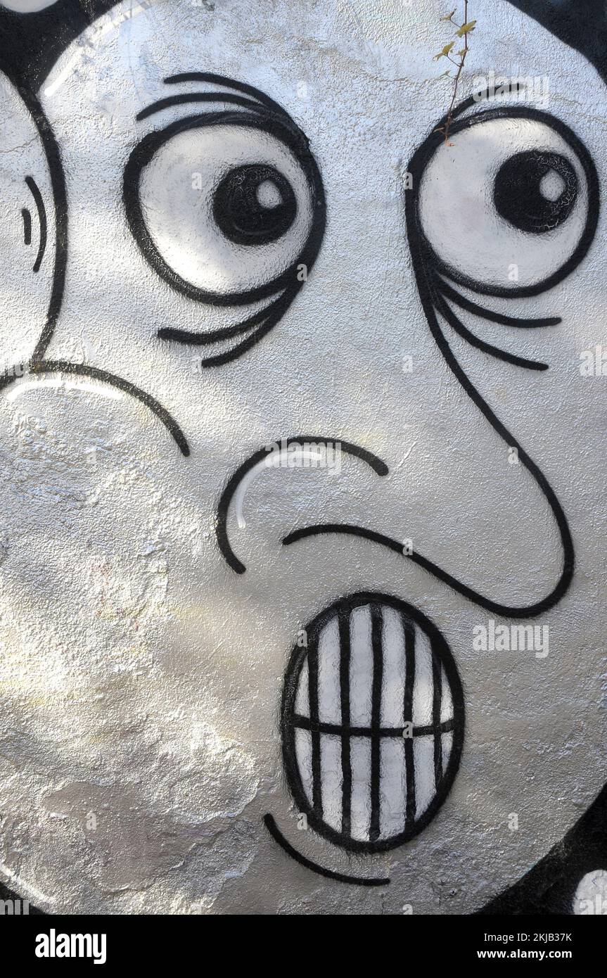 face draw on the wall Stock Photo - Alamy