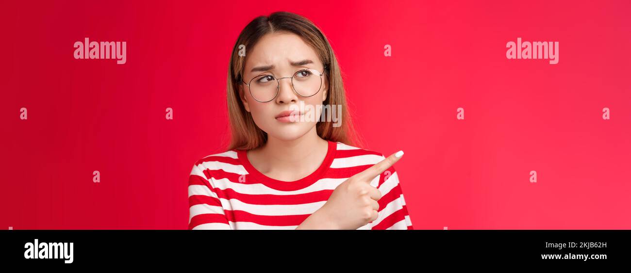 Disappointed doubtful frowning asian girl asking question reassure ...