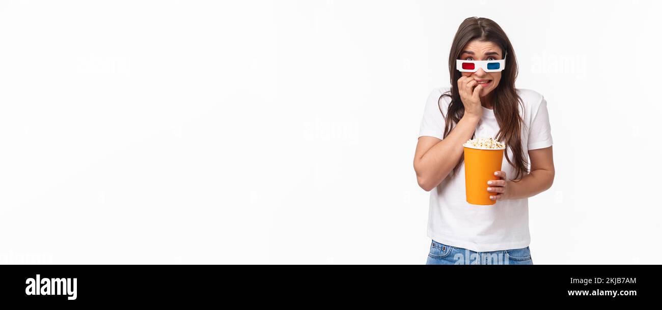 Entertainment, fun and holidays concept. Portrait of scared young cute ...