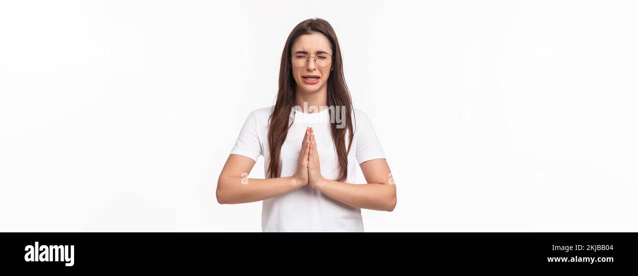 Waist-up portrait of desperate, hopeful young cute girl, sobbing and ...