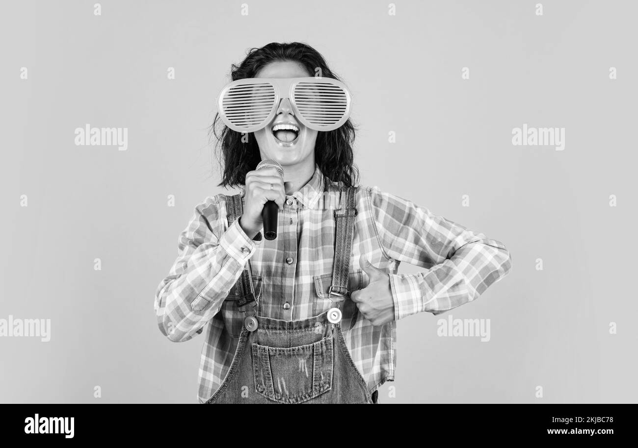 feel a success. Have Fun on Celebration. woman singing with microphone ...