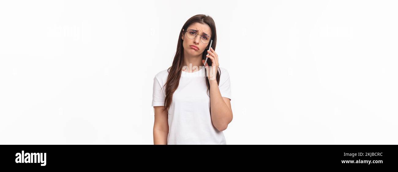 Communication, technology and lifestyle concept. Portrait of gloomy and ...