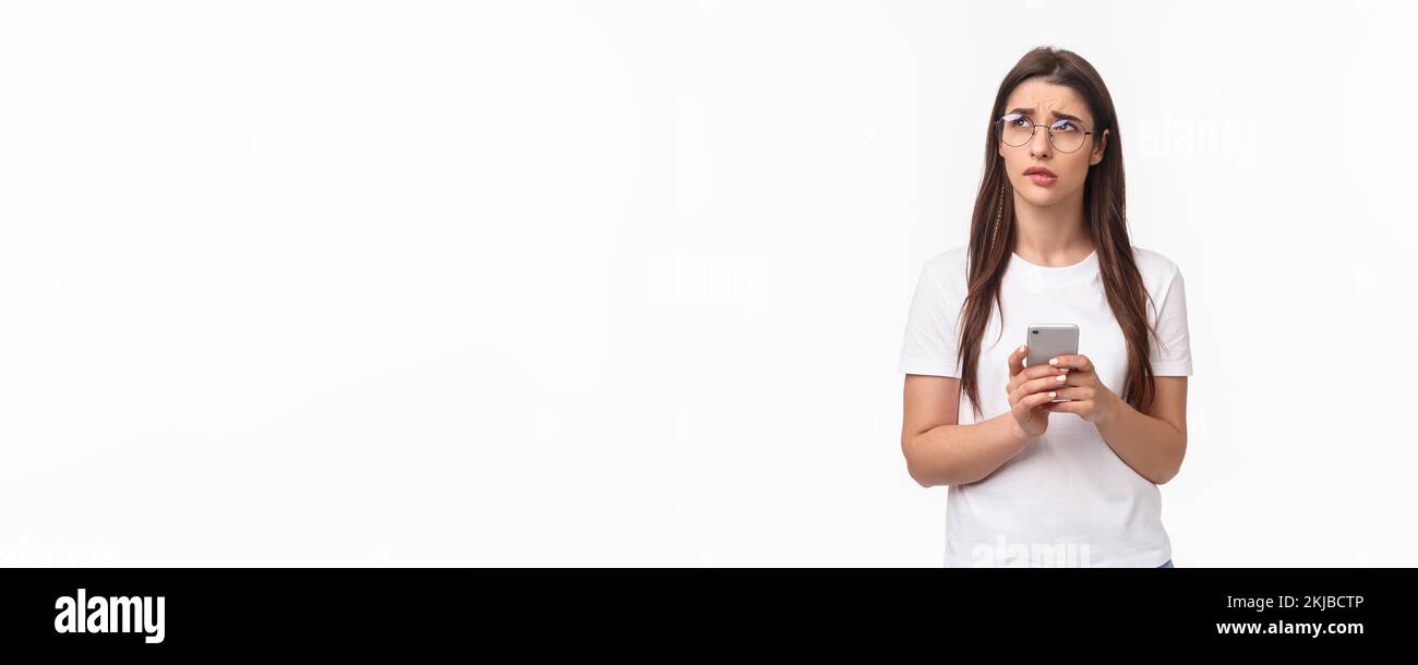 Communication, technology and lifestyle concept. Portrait of troubled ...