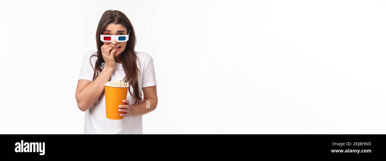 Entertainment, fun and holidays concept. Portrait of scared young cute ...