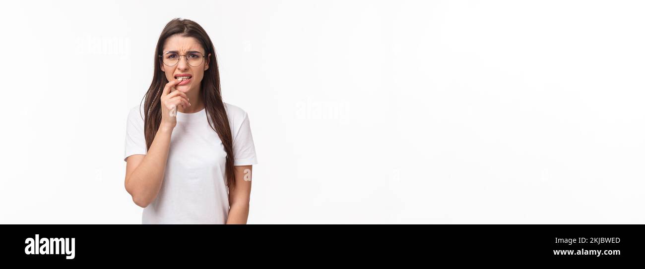 Waist-up portrait of embarrassed young cute girl feel nervous ...