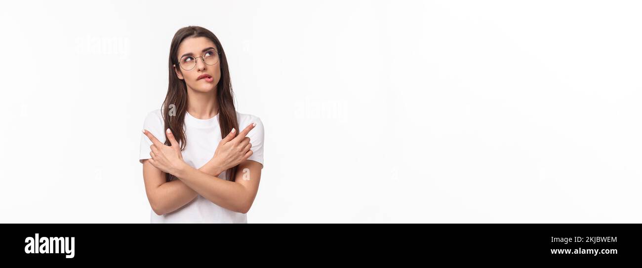 Waist-up portrait of thoughtful, smart and creative young decisive ...