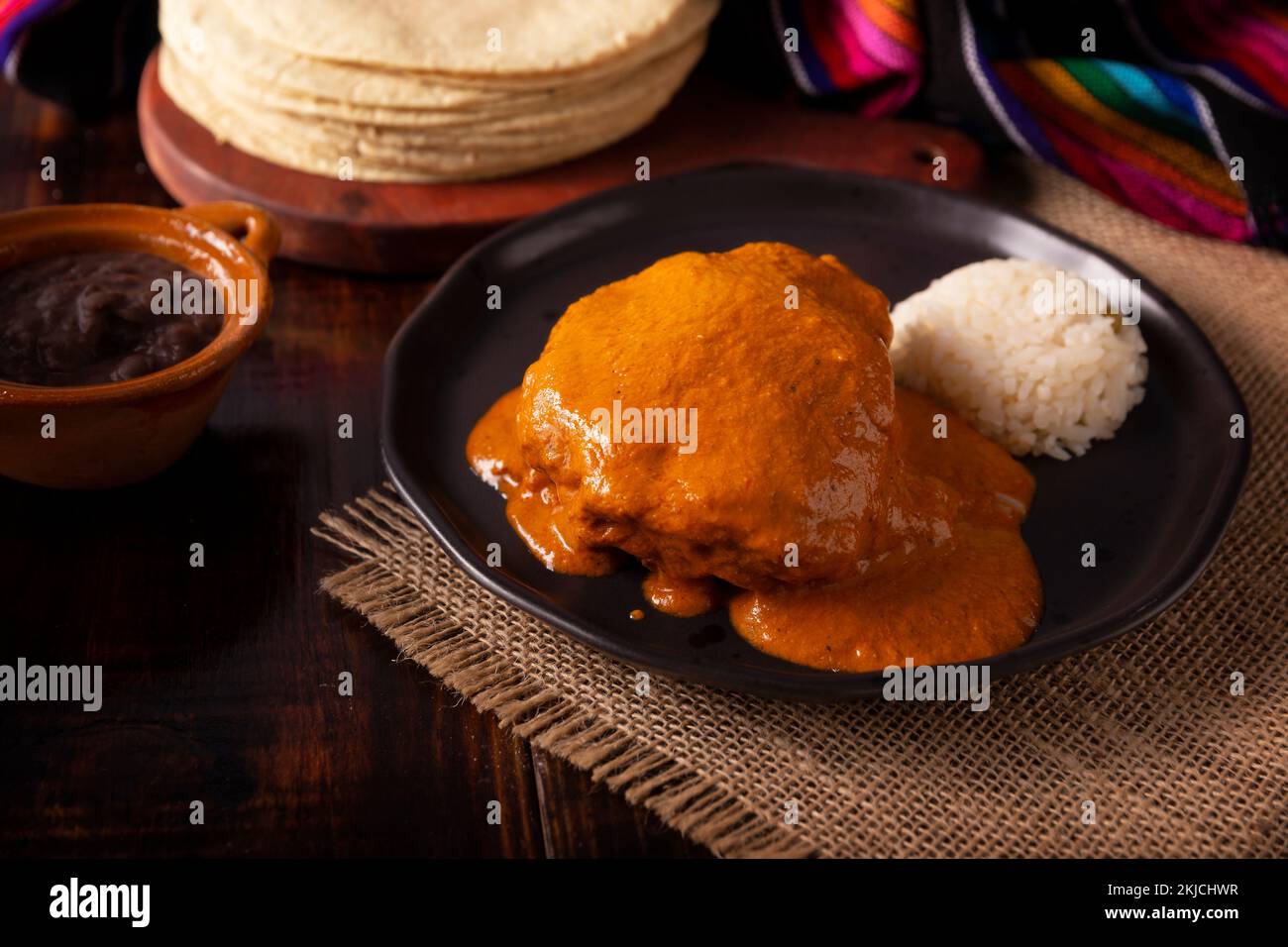 Encacahuatado. Mexican mole made from peanuts, dried chilies, sesame ...