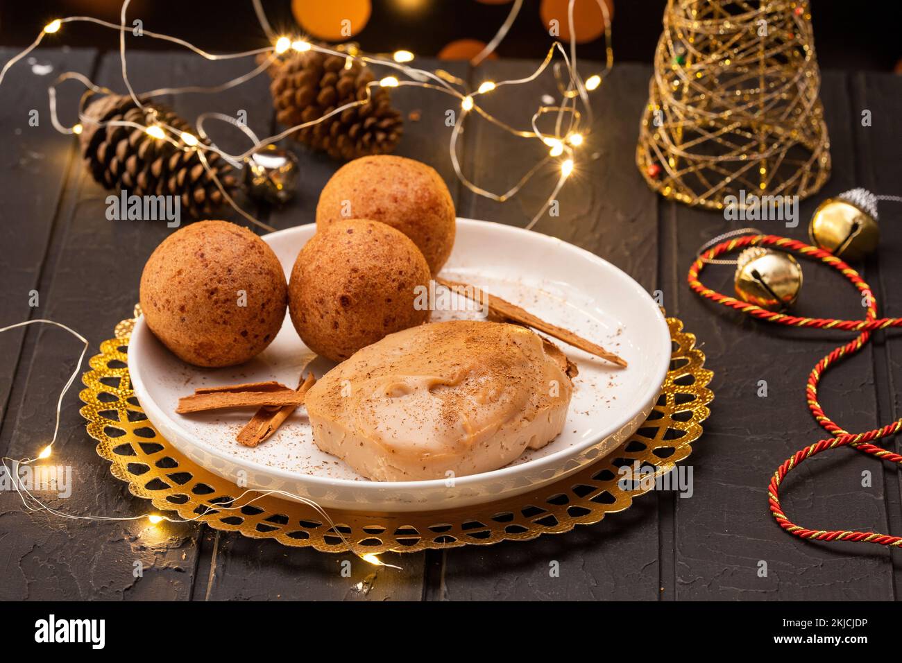Traditional Colombian christmas food - Buñuelos y natilla Stock Photo ...