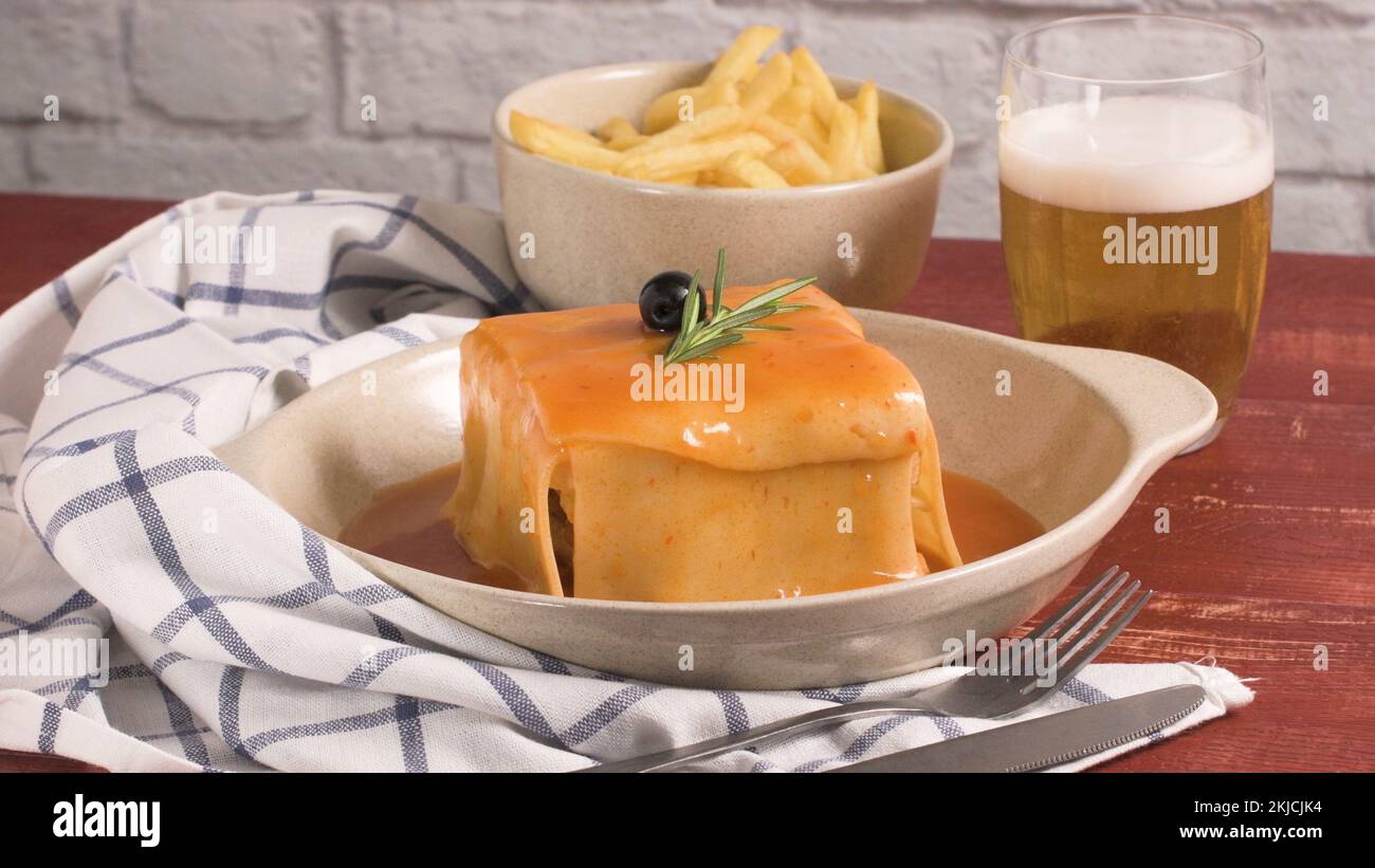 Traditional Portuguese snack food. Francesinha sandwich of bread ...