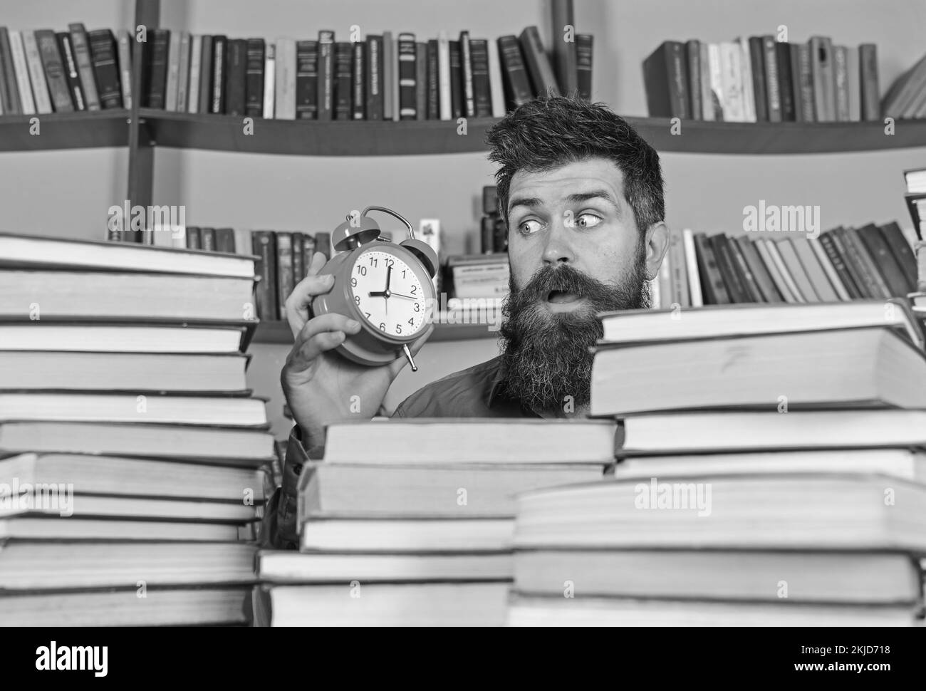 Teacher or student with beard studying in library. Man, scientist ...
