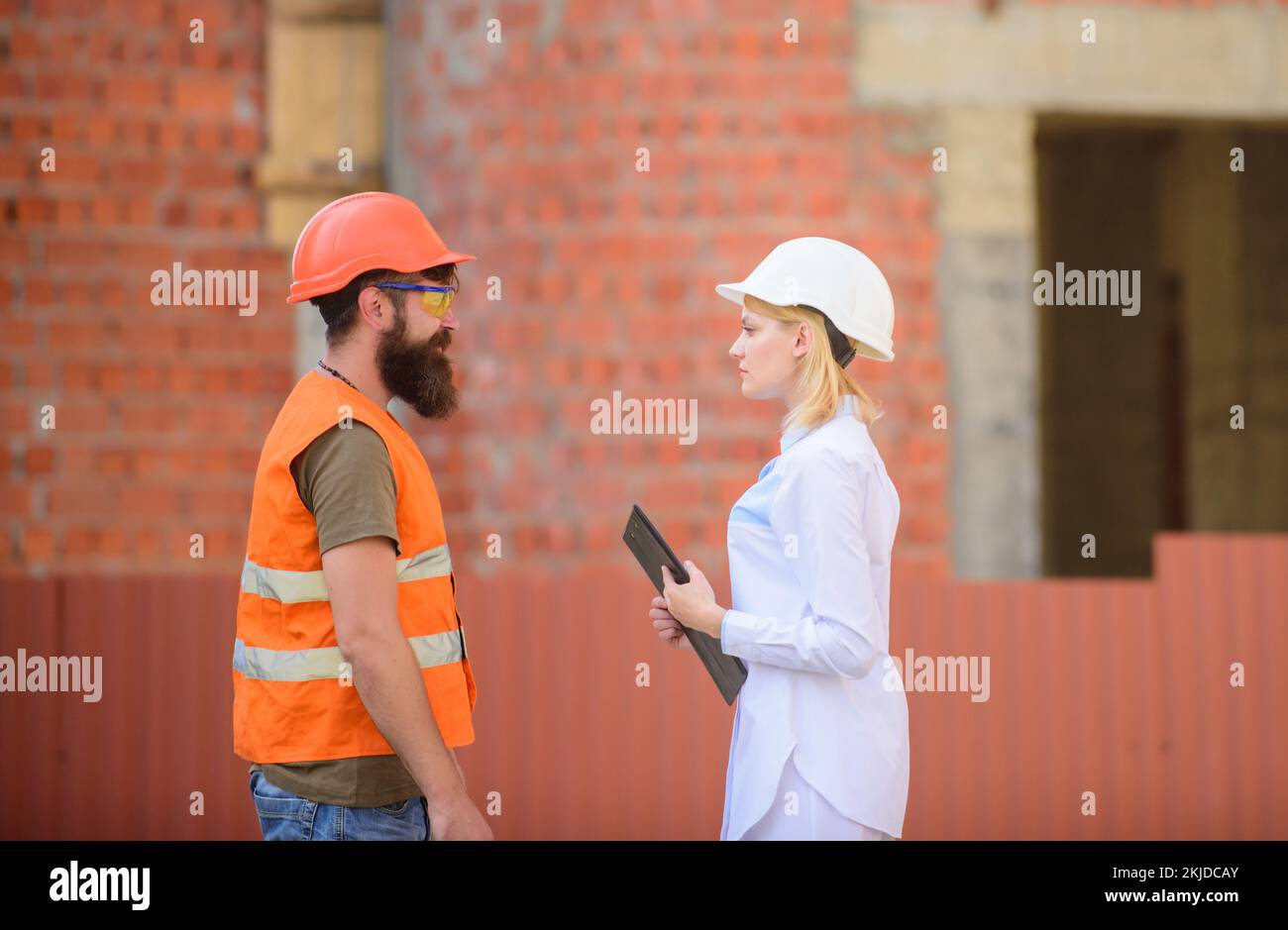 Discuss progress plan. Construction industry concept. Woman engineer ...