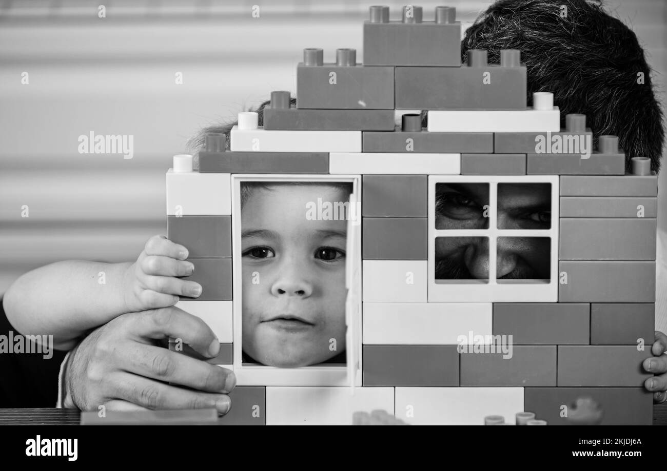 Boy and man on defocused background. Dad and kid Stock Photo - Alamy