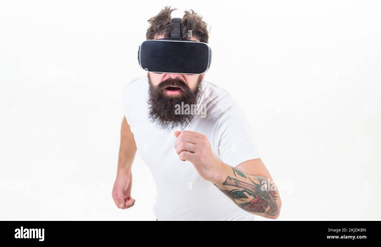 Man bearded gamer VR glasses white background. Virtual reality game concept. Cyber sport. Guy ...