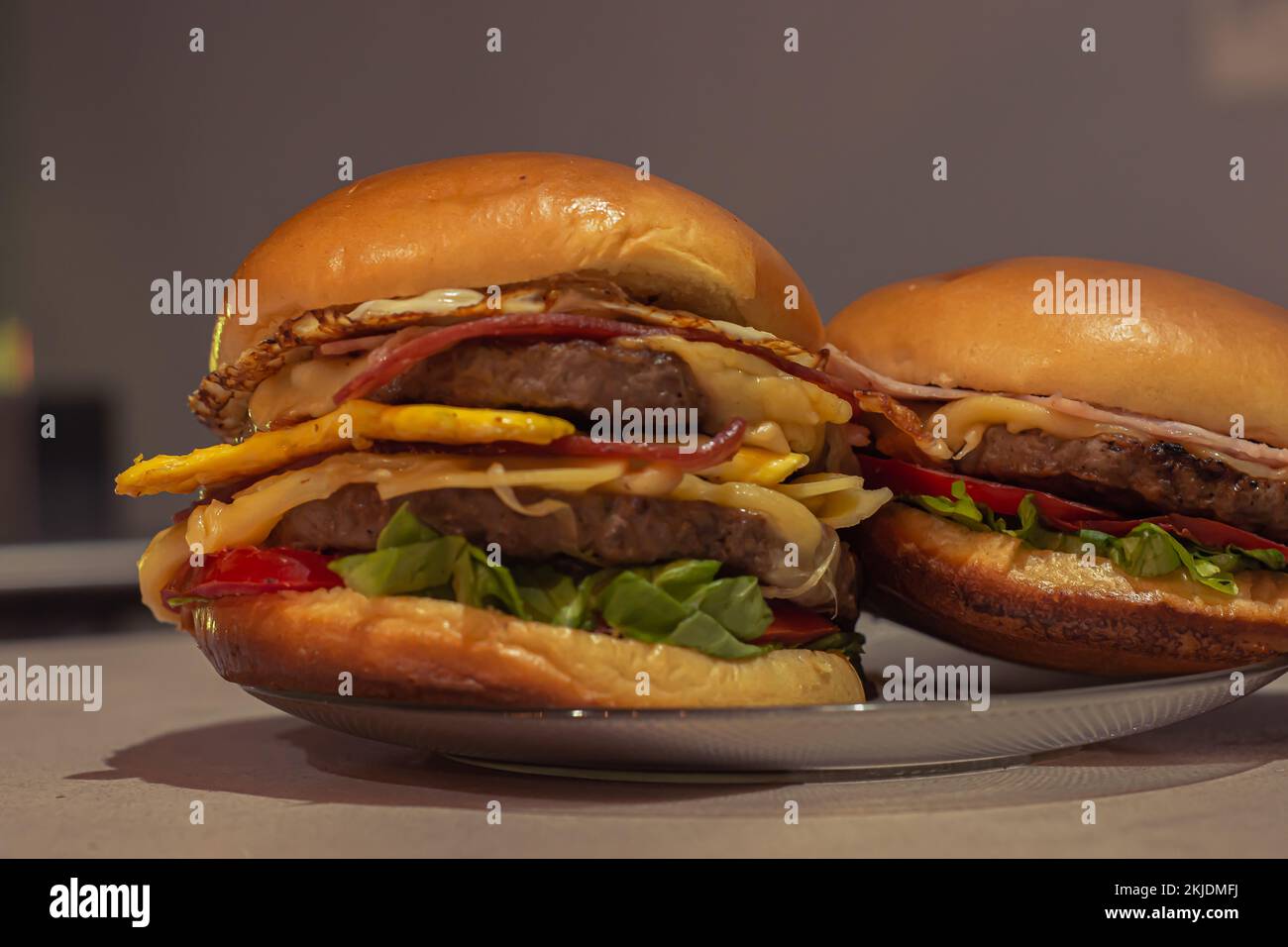 Delicious fresh home made Burguers with vegetables, Food advertising ...