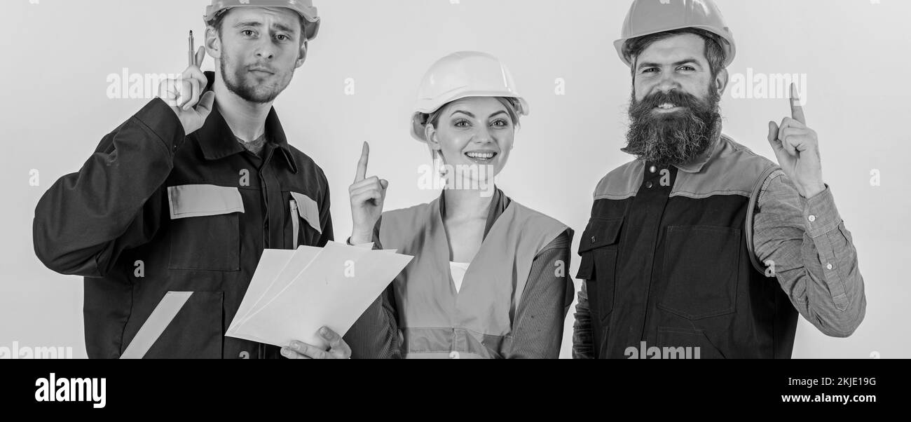 three people have idea, success discussion, builders Stock Photo - Alamy