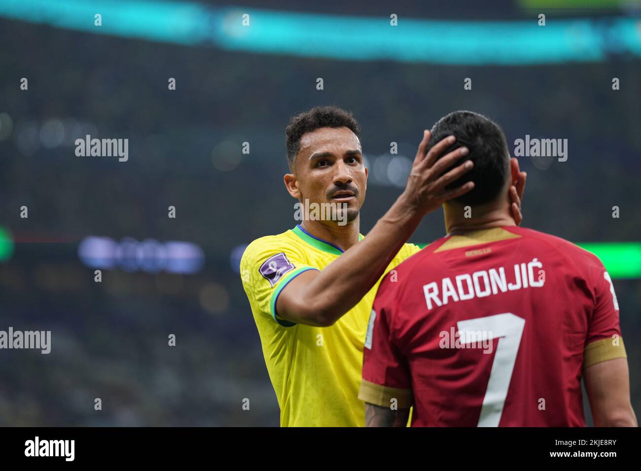 Lusail, Qatar. 24th Nov, 2022. (L to R) Danilo (BRA), Nemanja Radonjic ...
