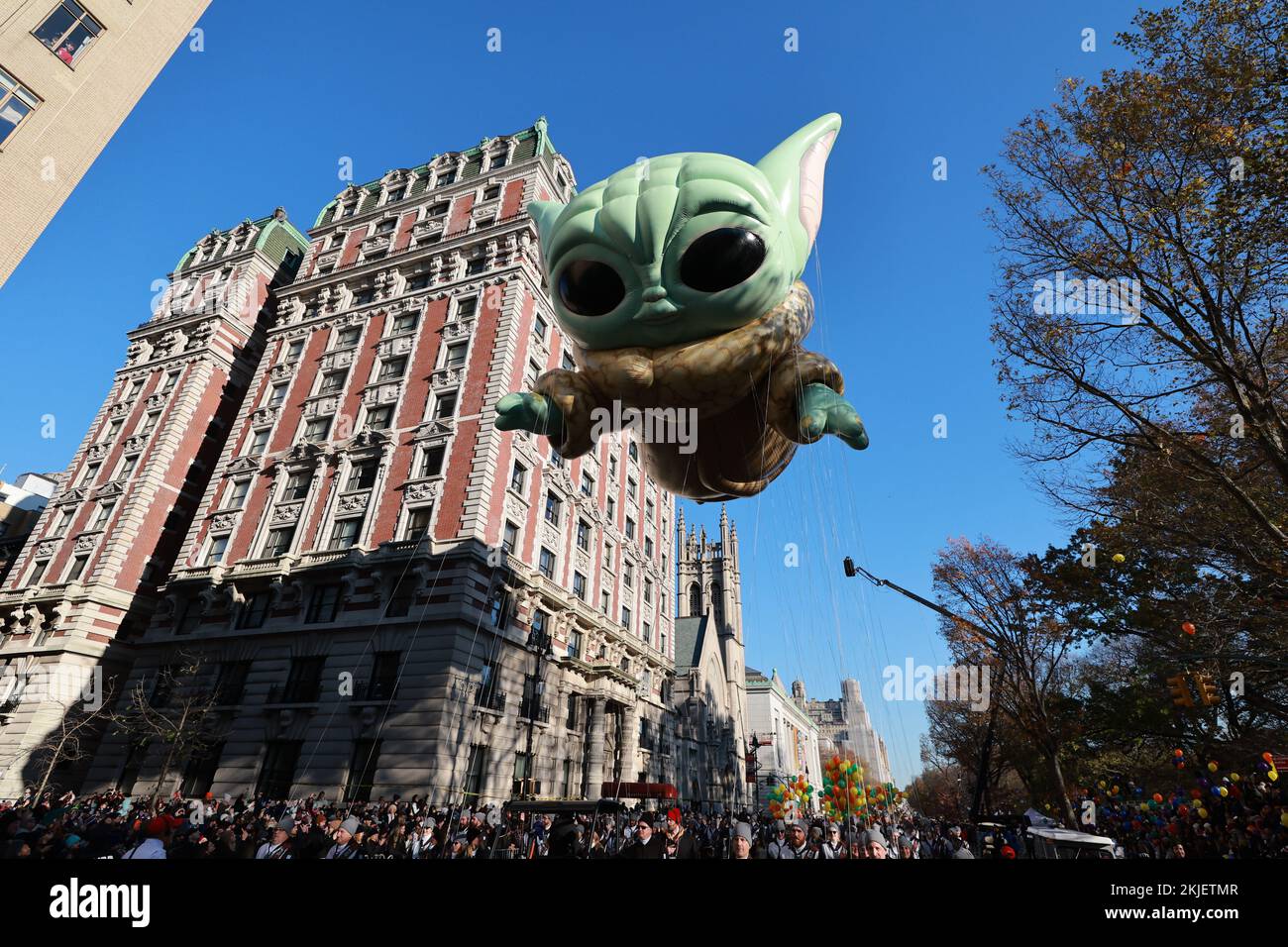 NEW YORK, NEW YORK - November 24, 2022: The Grogu balloon is led down ...