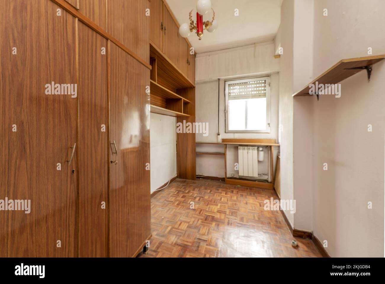 Small room with bright vintage wooden furniture and aluminum window ...