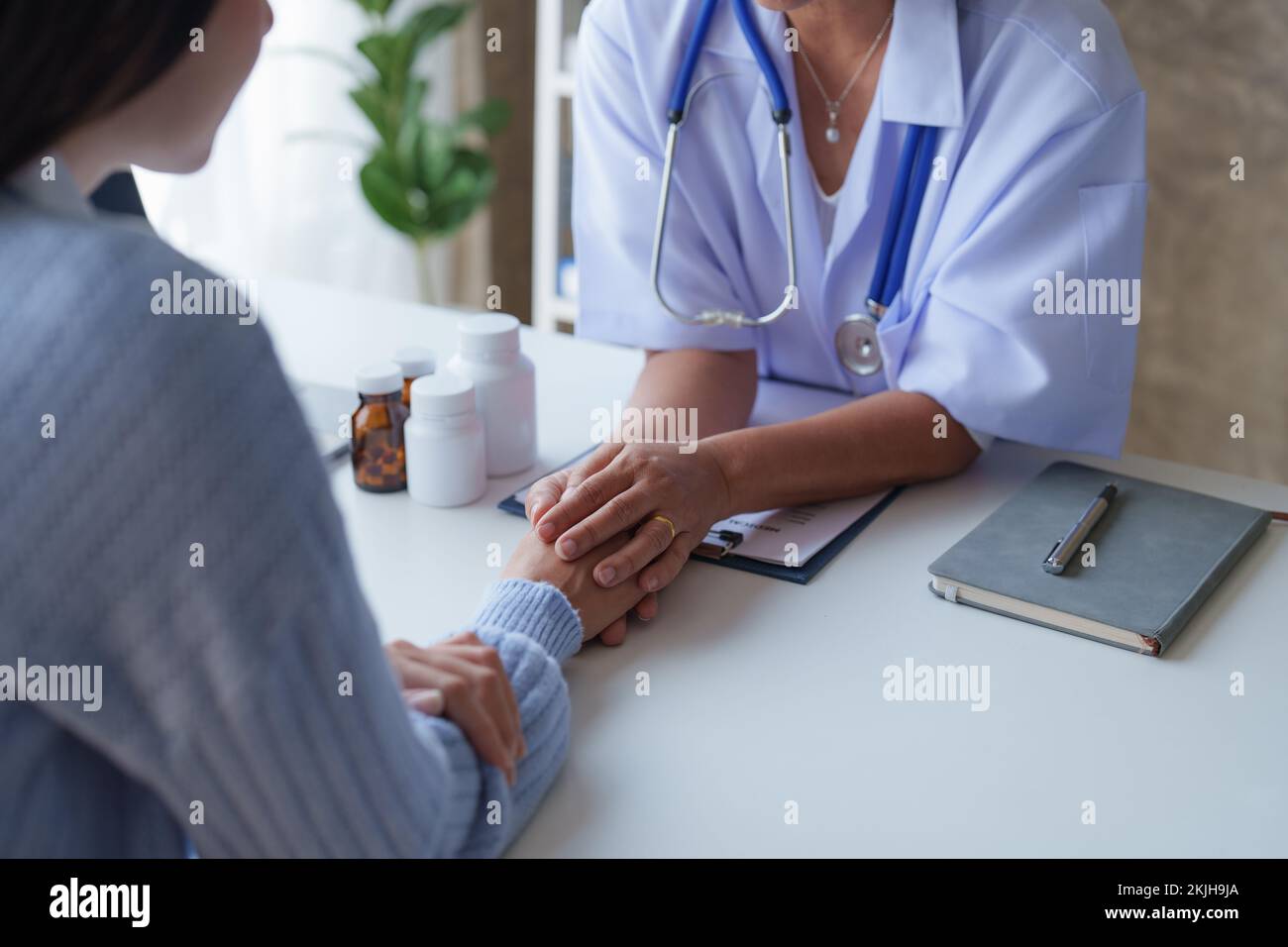 Doctor having conversation with patient while discussing explaining ...