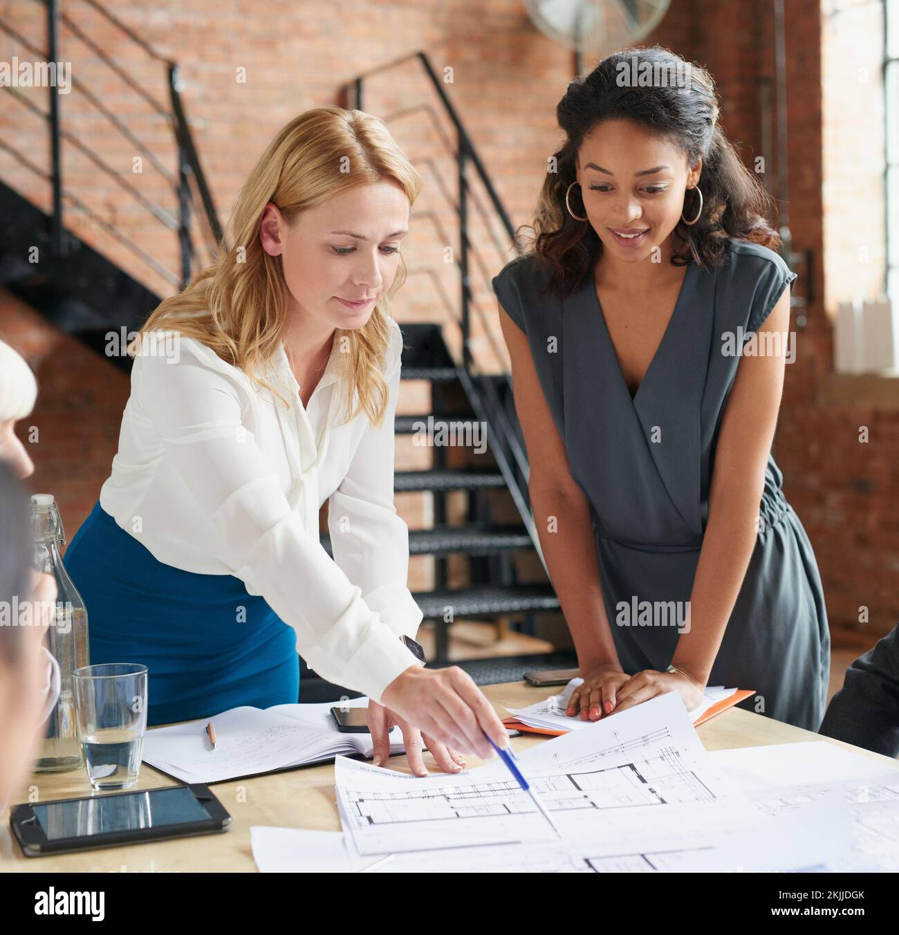 Blueprint, architecture and women in meeting planning an office ...