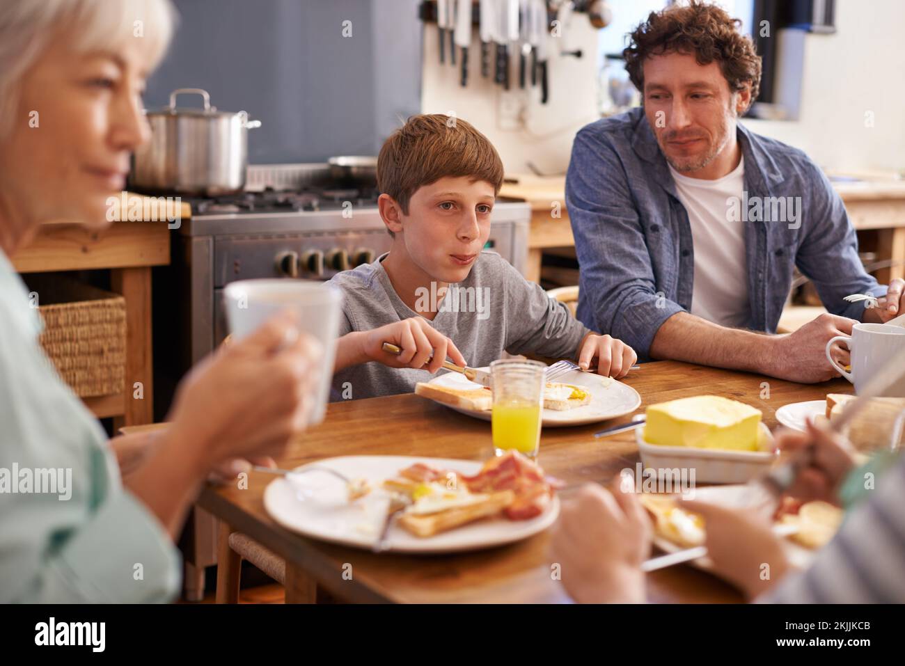 Digging in with enthusiasm. A cropped shot of a young boy with a ...